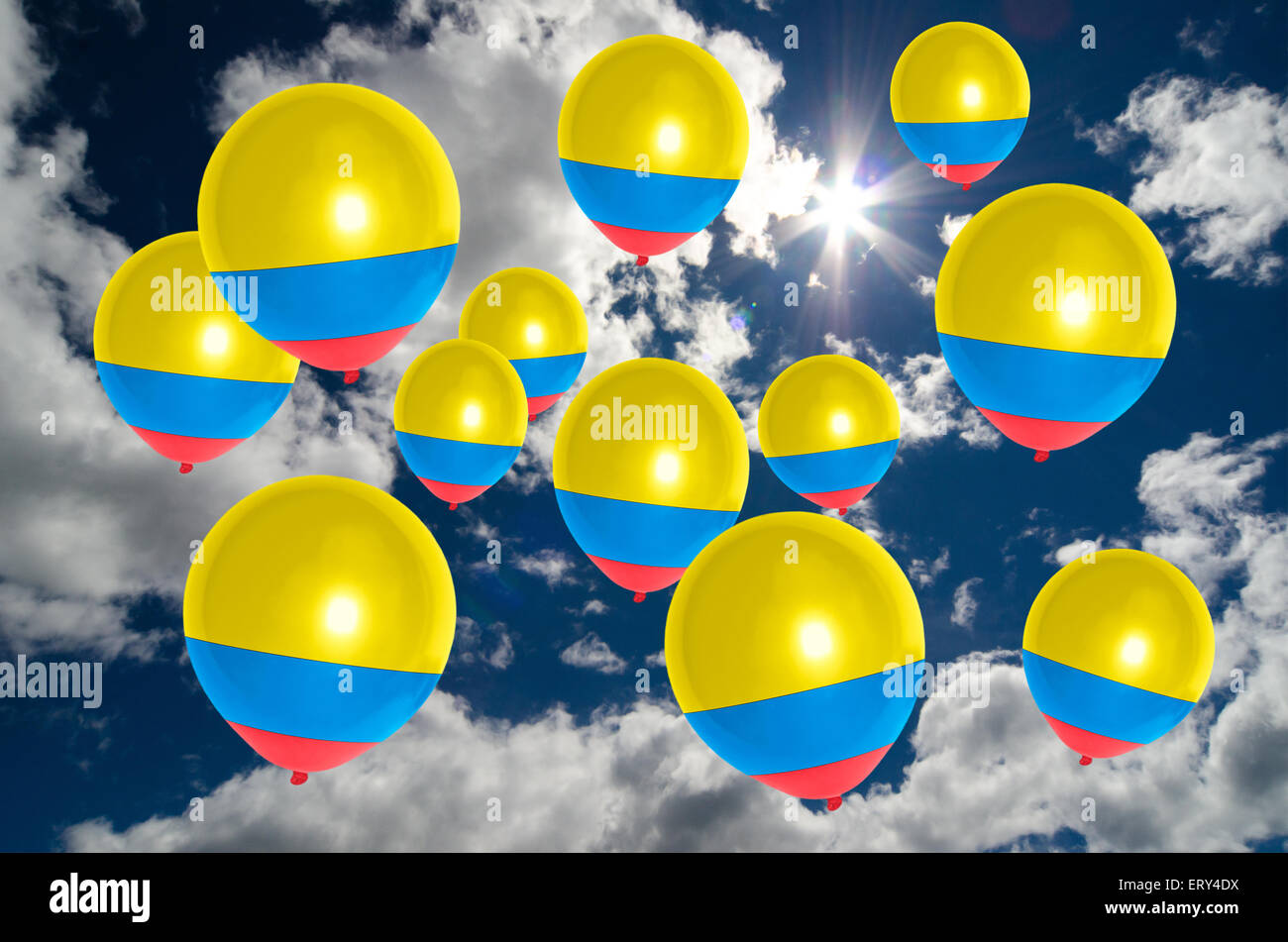 many ballons in colors of colombia flag flying on sky Stock Photo - Alamy