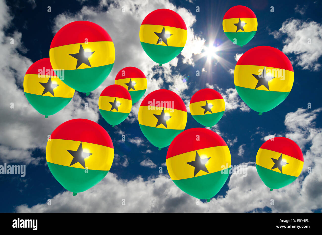 many ballons in colors of ghana flag flying on sky Stock Photo - Alamy