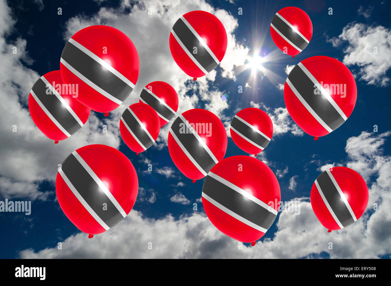 many ballons in colors of trinidad tobago flag flying on sky Stock ...