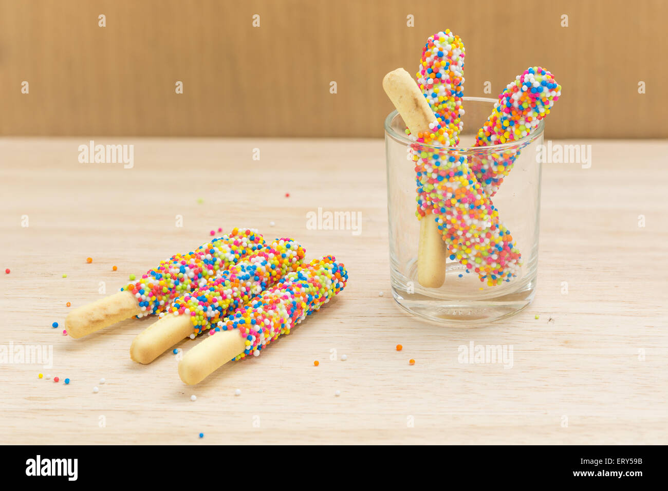Sweet bread sticks with chocolate and colorful sugar sprinkles Stock ...