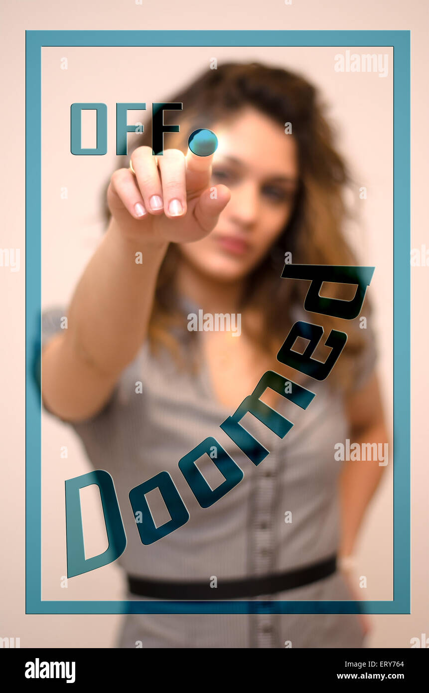 young woman turning off Doomed on digital panel Stock Photo - Alamy