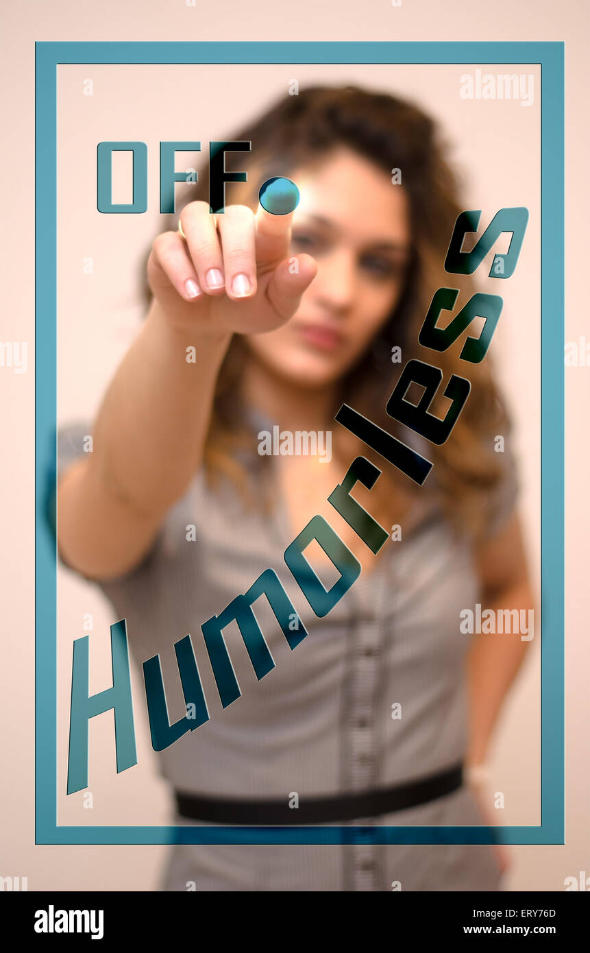 young woman turning off Humorless on digital panel Stock Photo - Alamy
