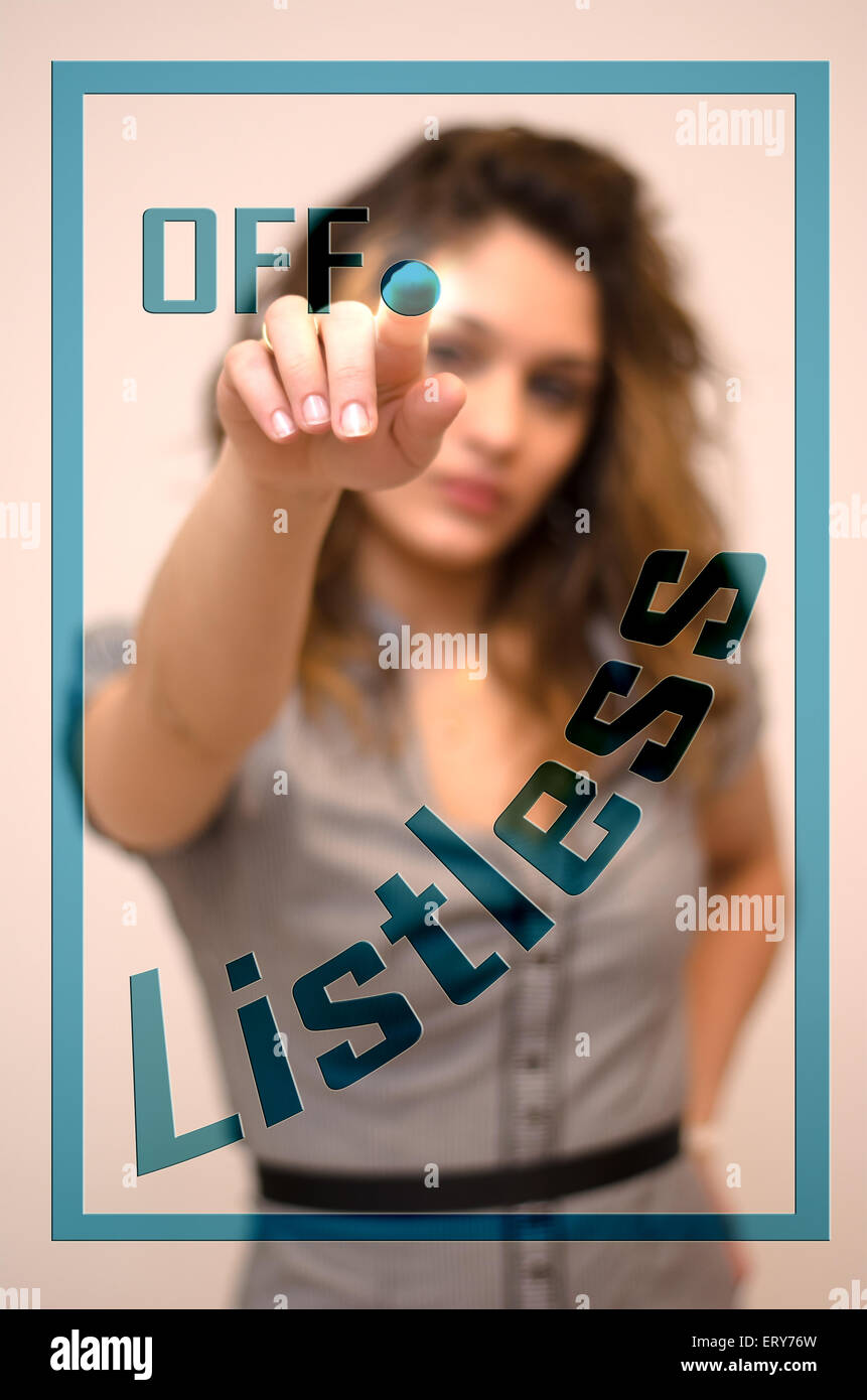 young woman turning off Listless on digital panel Stock Photo - Alamy