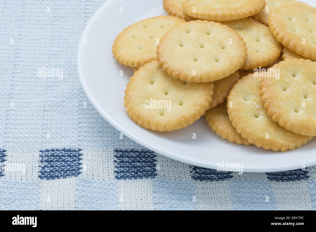 Crackers in a white bowl on the table Stock Photo - Alamy