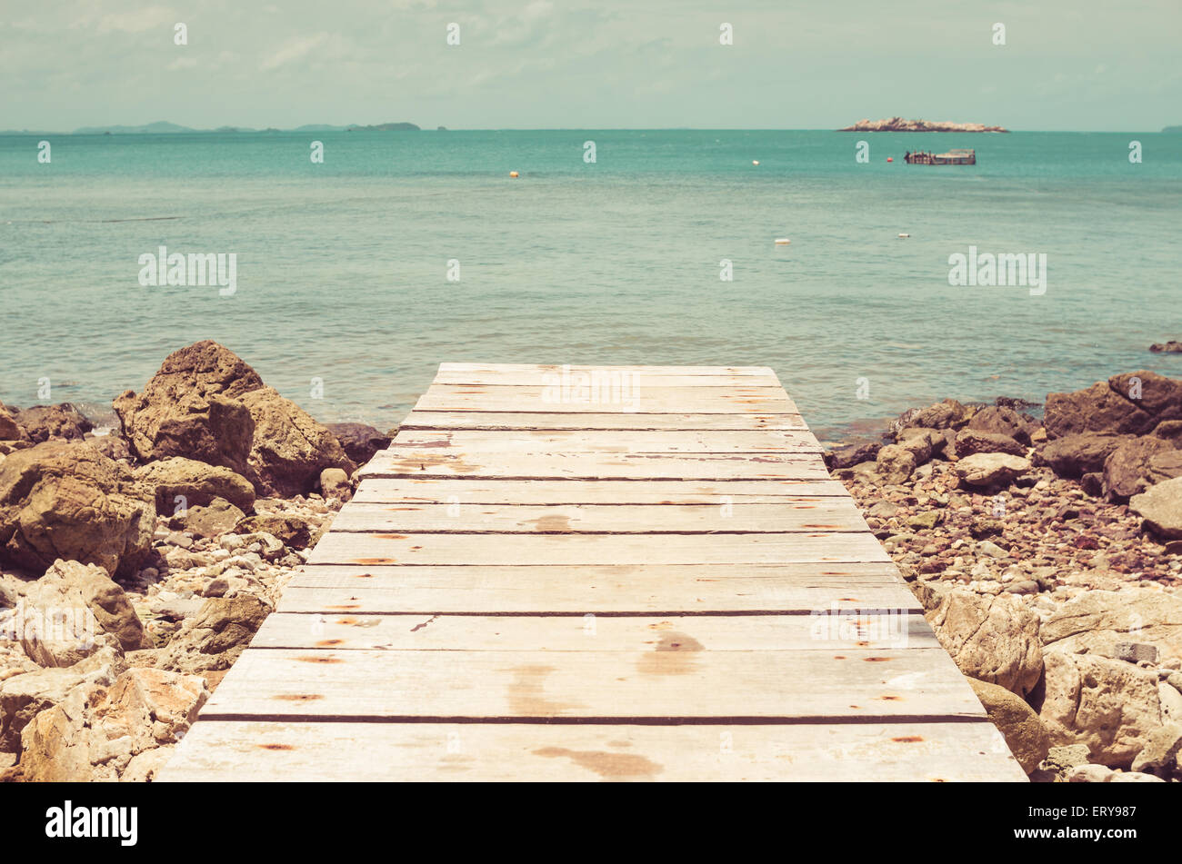 dock rock and blue sea in Thailand vintage Stock Photo - Alamy