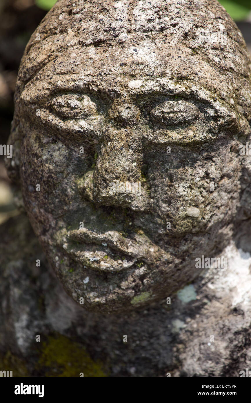 Batak carving stone statue in Tuk-tuk village, Toba lake. Indonesia ...