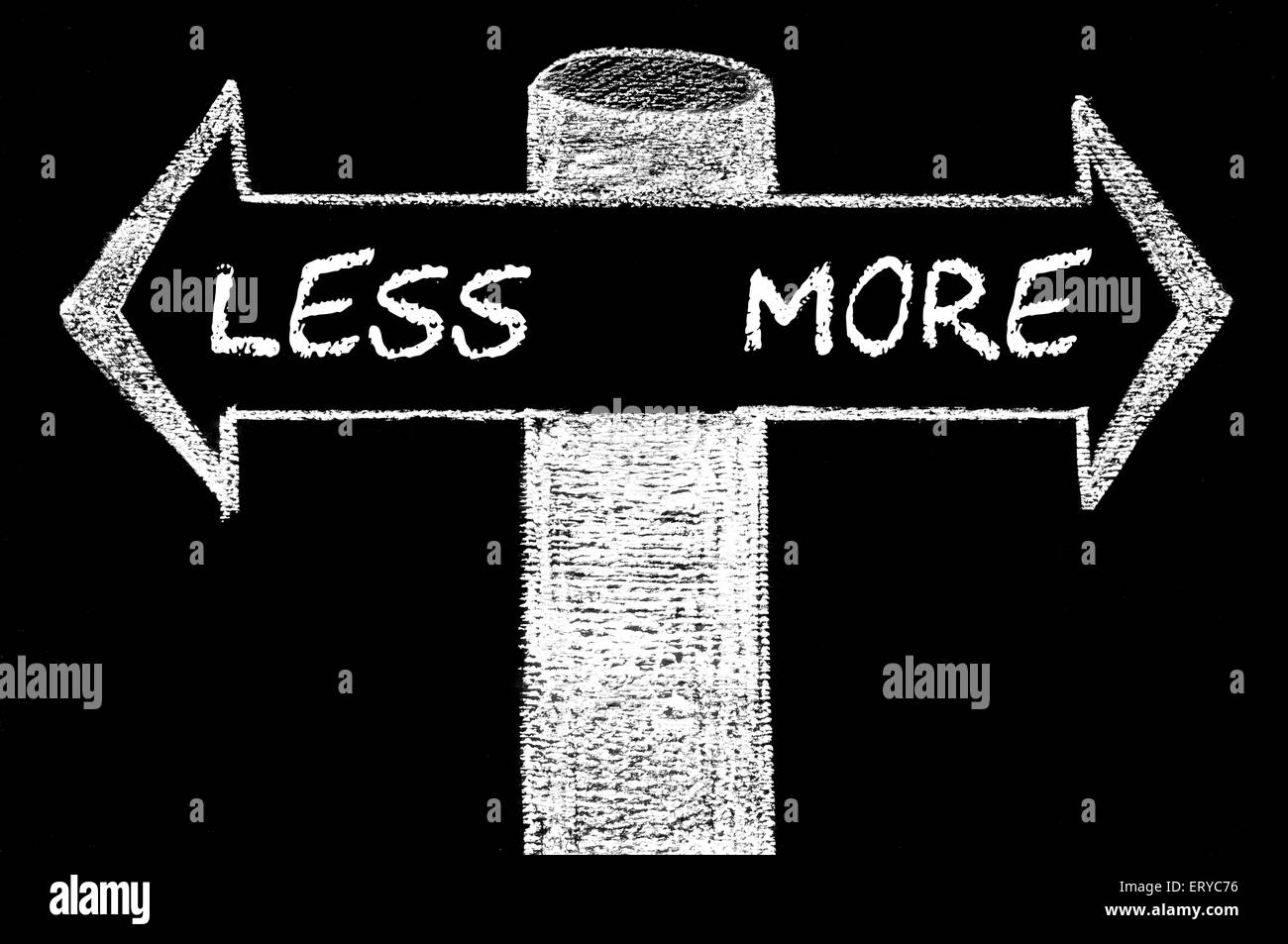 Opposite arrows with Less versus More. Hand drawing with chalk on ...