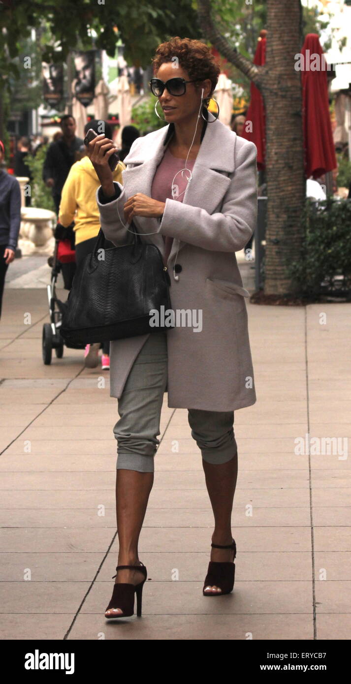 Nicole Murphy goes shopping at The Grove wearing her earphones and ...