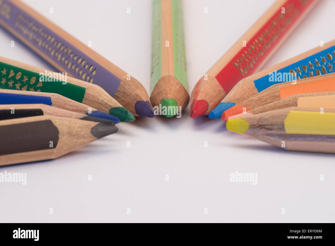 Set of crayons pointing to the center on white background Stock Photo ...