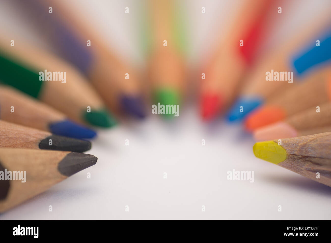 Set of crayons pointing to the center on white background Stock Photo ...