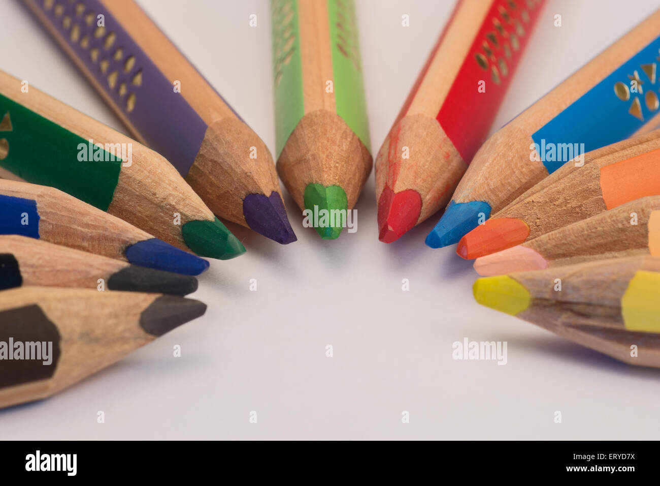 Set of crayons pointing to the center on white background Stock Photo ...