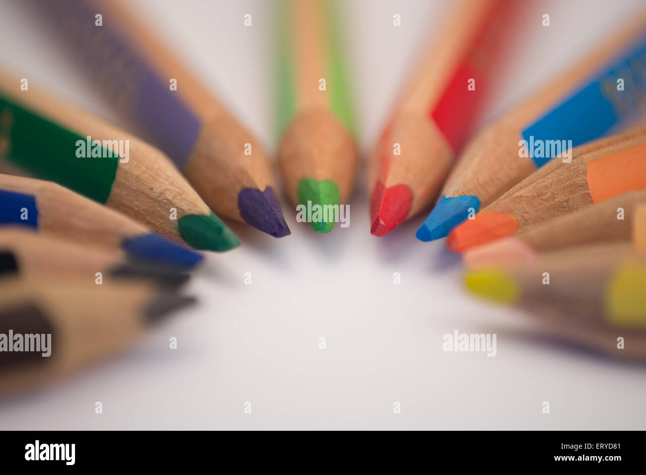 Set of crayons pointing to the center on white background Stock Photo ...