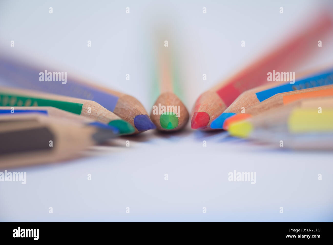 Set of crayons pointing to the center on white background Stock Photo ...