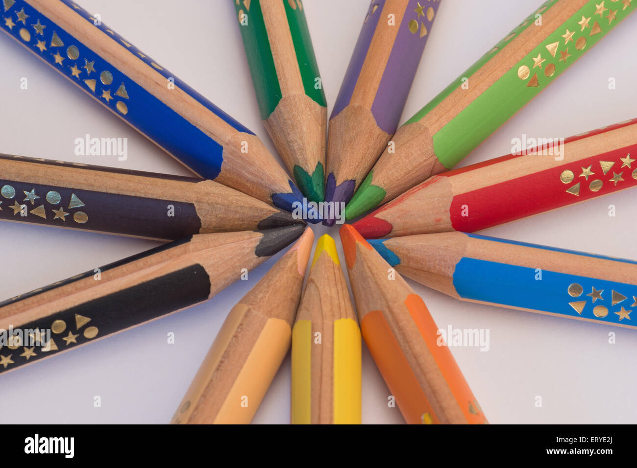 Set of crayons pointing to the center on white background Stock Photo ...