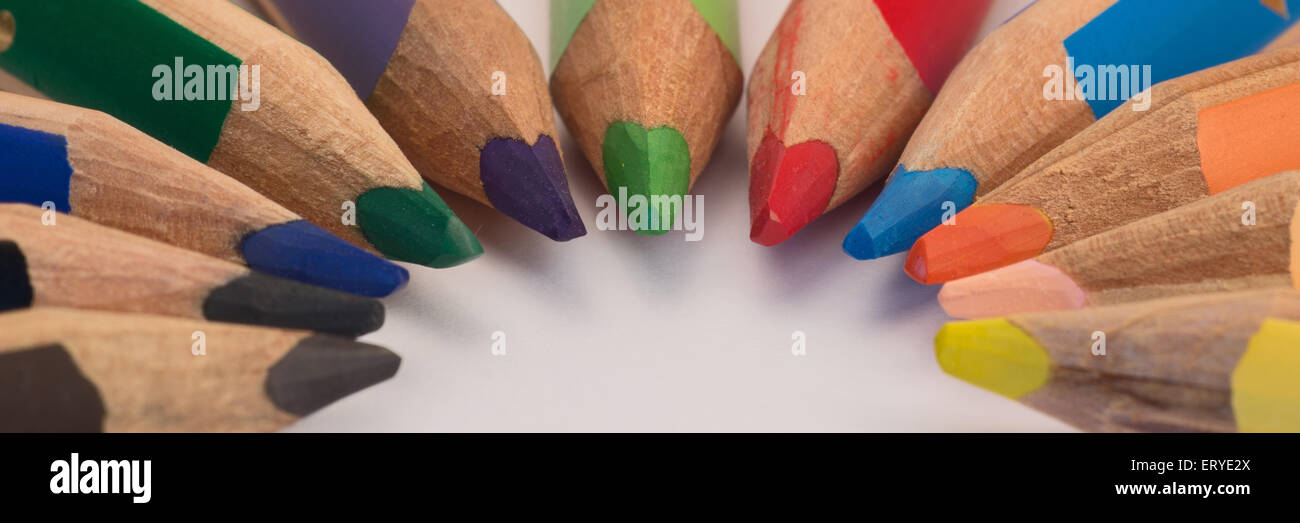 Set of crayons pointing to the center on white background Stock Photo ...