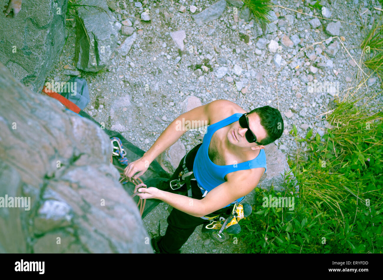 man climbing mountain with sunglasses Stock Photo - Alamy