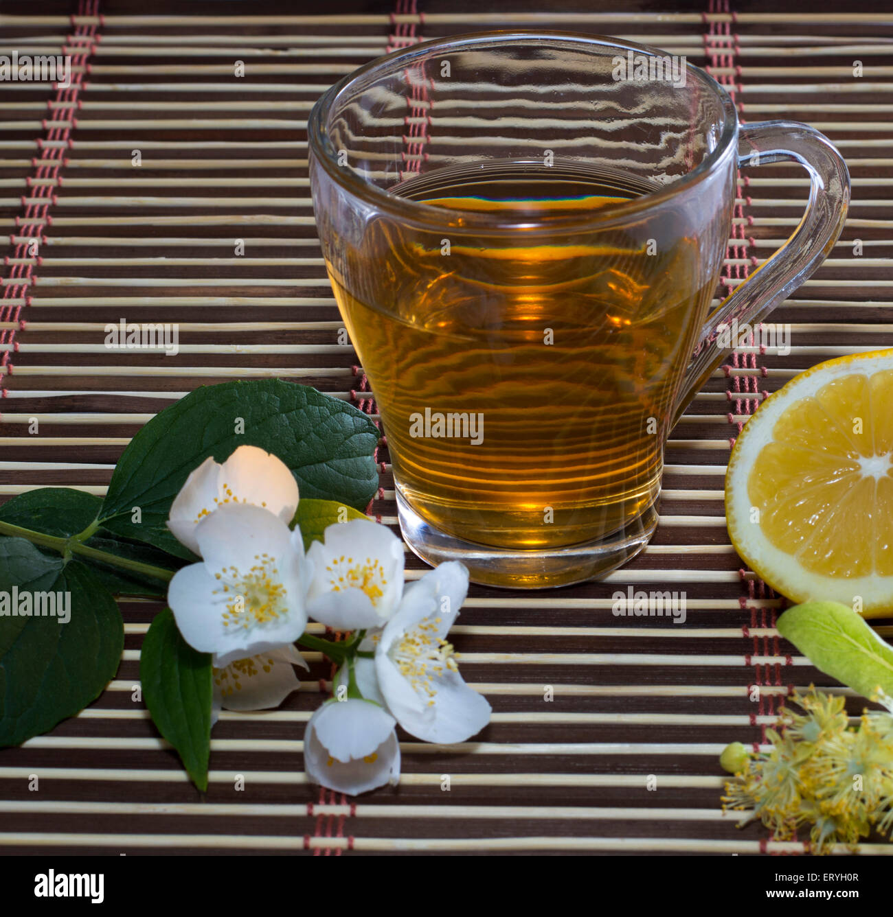 glass of lime tea with a lemon close up Stock Photo - Alamy