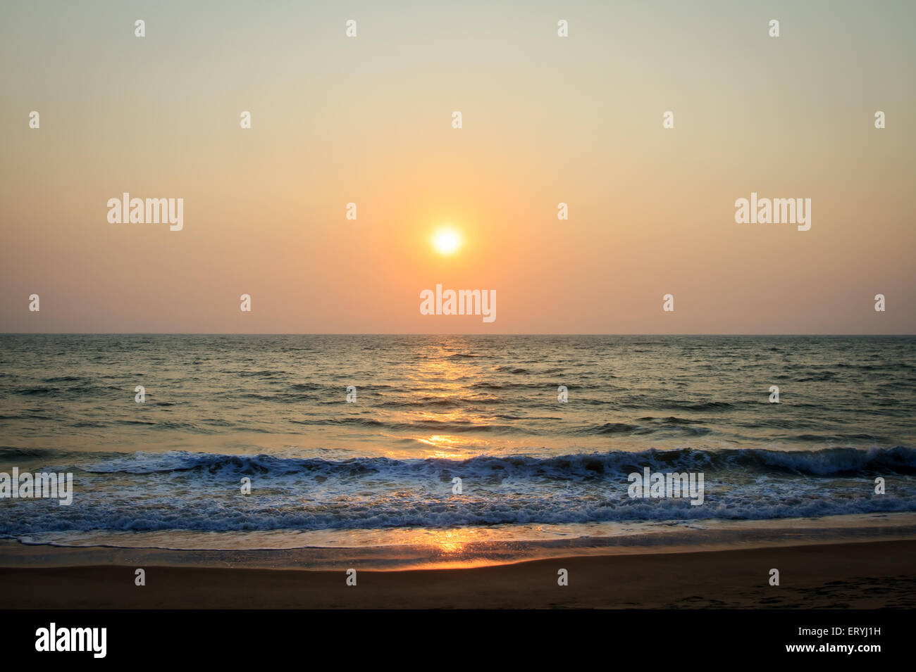 Evening scene with sunset on sea Stock Photo - Alamy