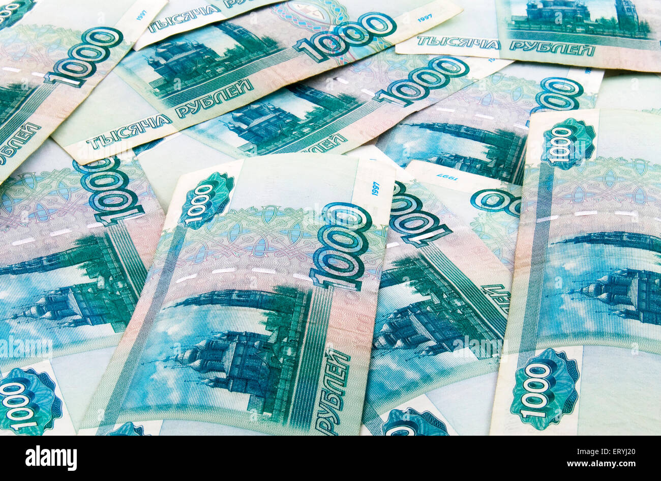 Russian one thousand roubles bills scattered as background Stock Photo ...