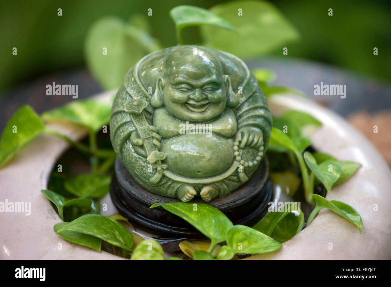 laughing buddha monk statue India Asia Stock Photo - Alamy