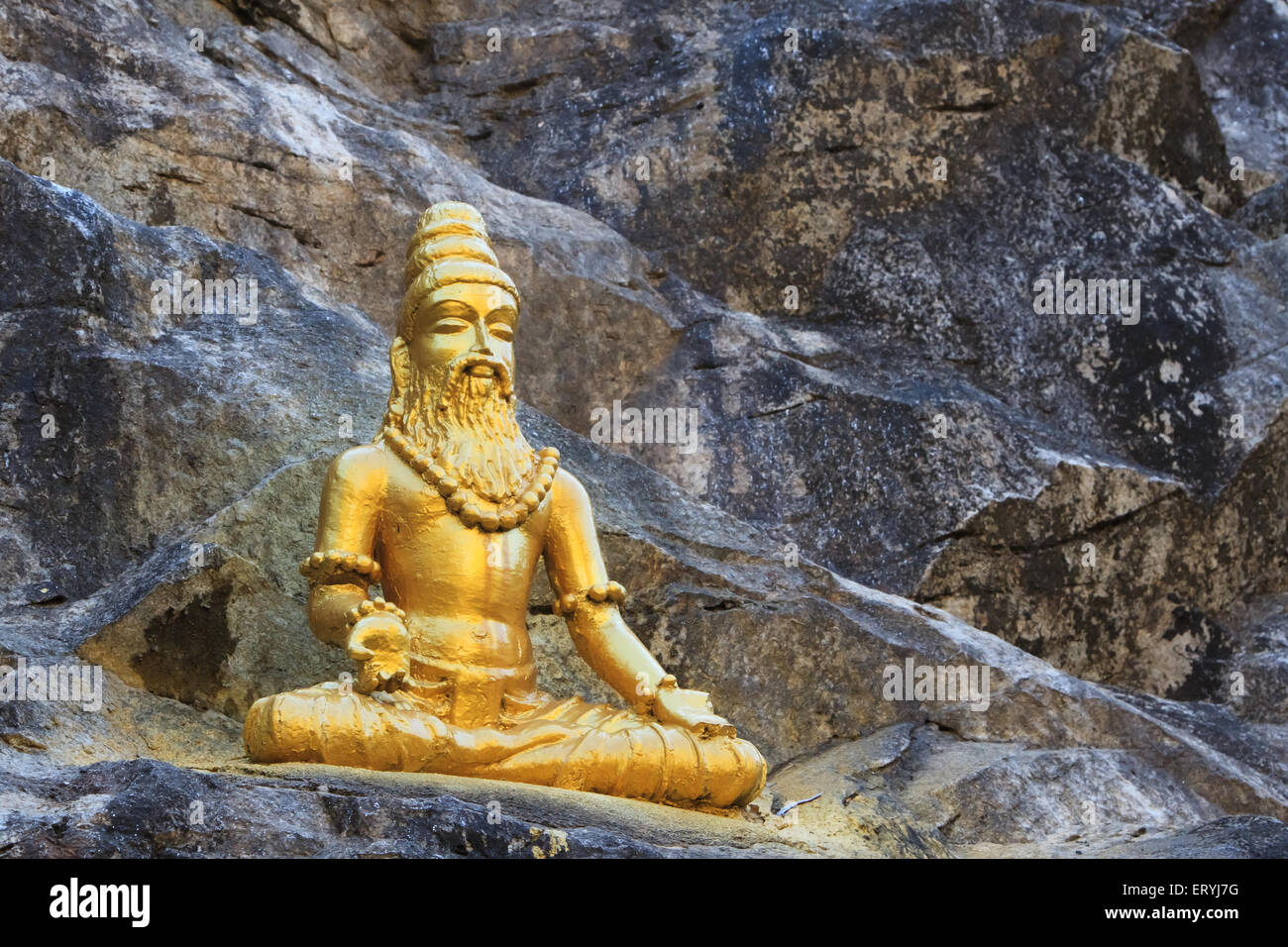 Golden statue meditating sitting hi-res stock photography and images ...