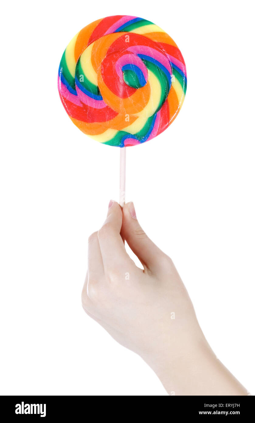 Hand holding lollipop isolated over white Stock Photo - Alamy