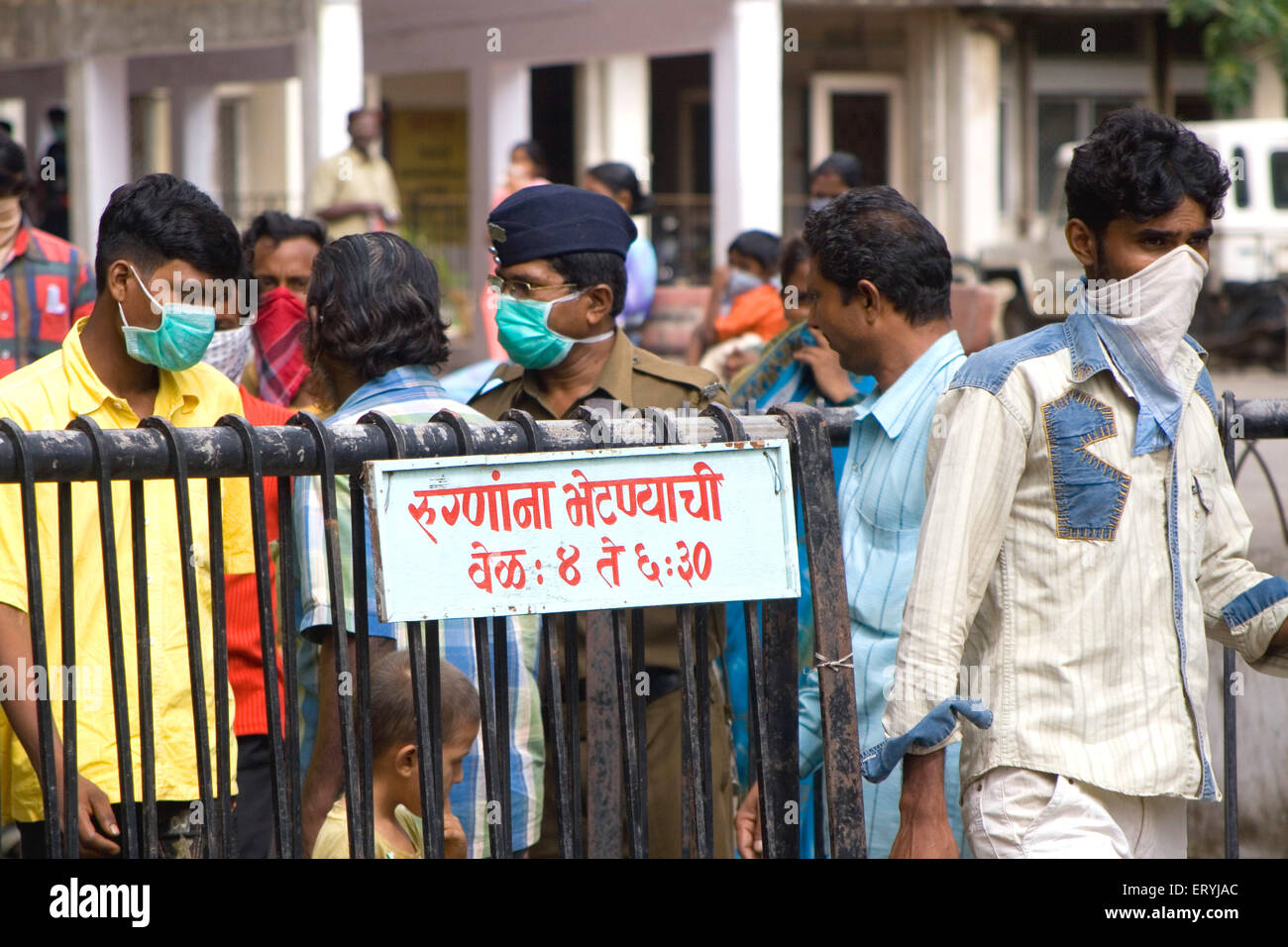 Peoples wearing masks for virus protection ; Bombay ; Mumbai ...