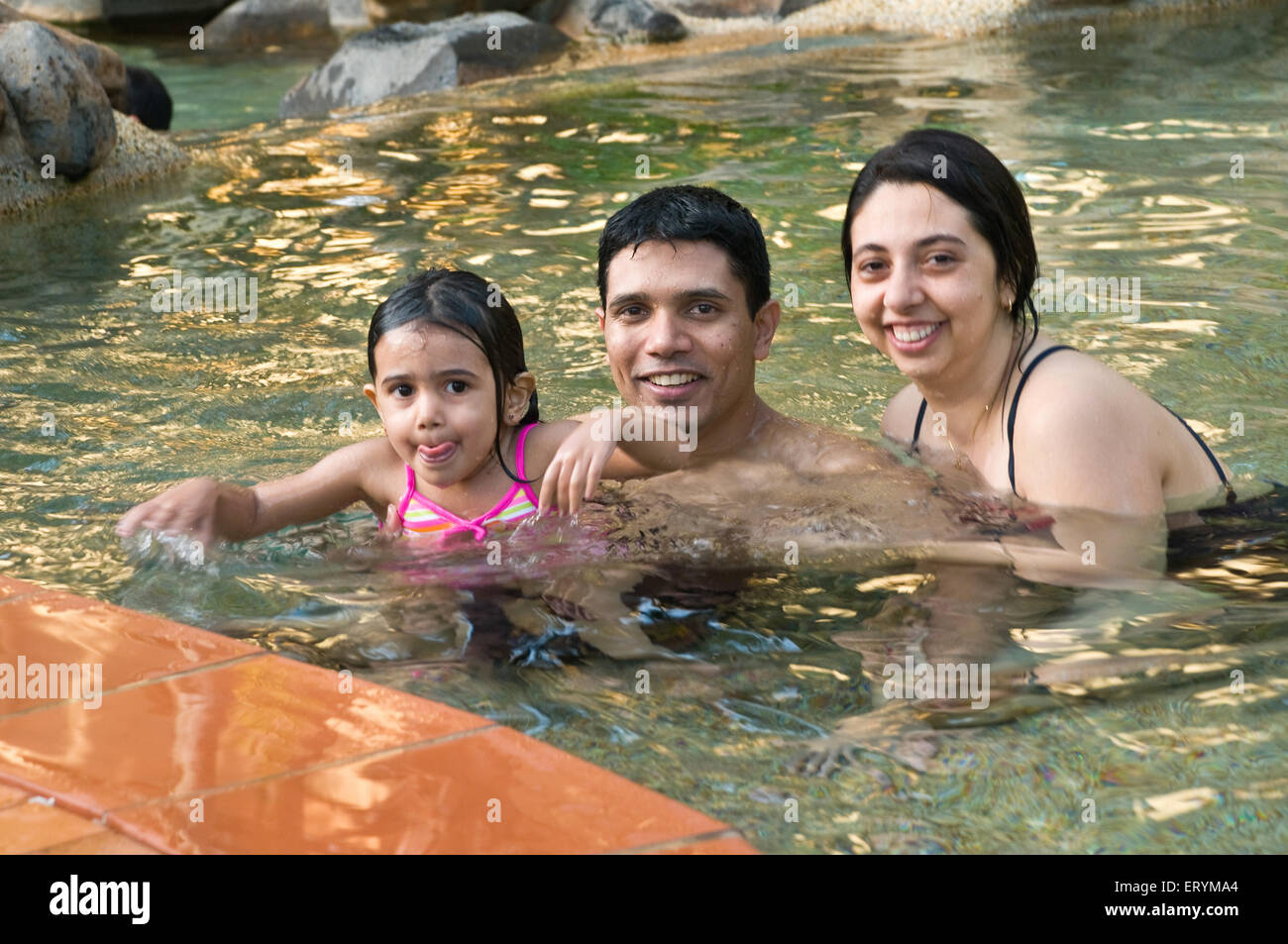 Indian man outdoor swimming pool hi-res stock photography and images ...