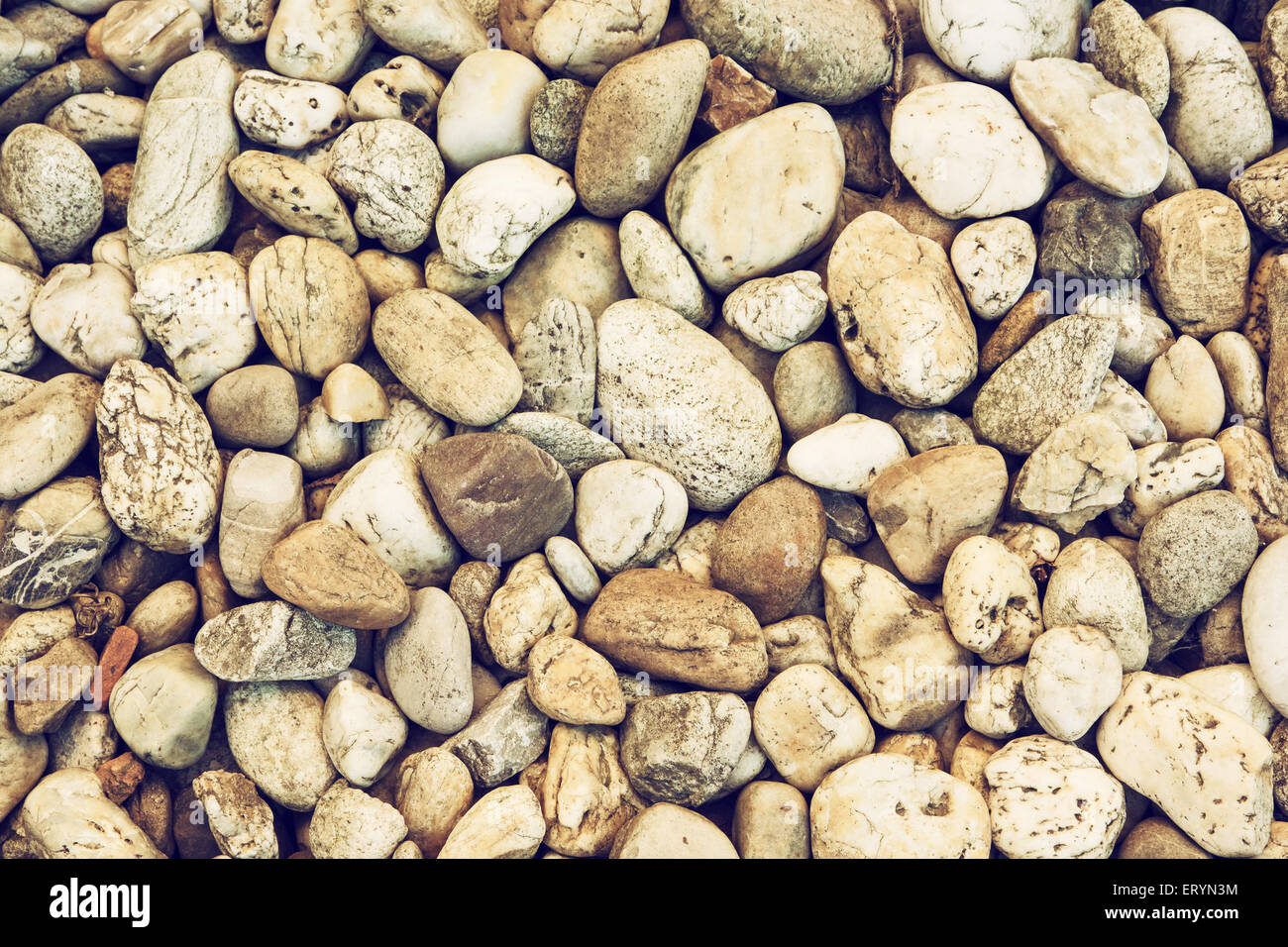 Background of smooth stones. Toned effect Stock Photo - Alamy