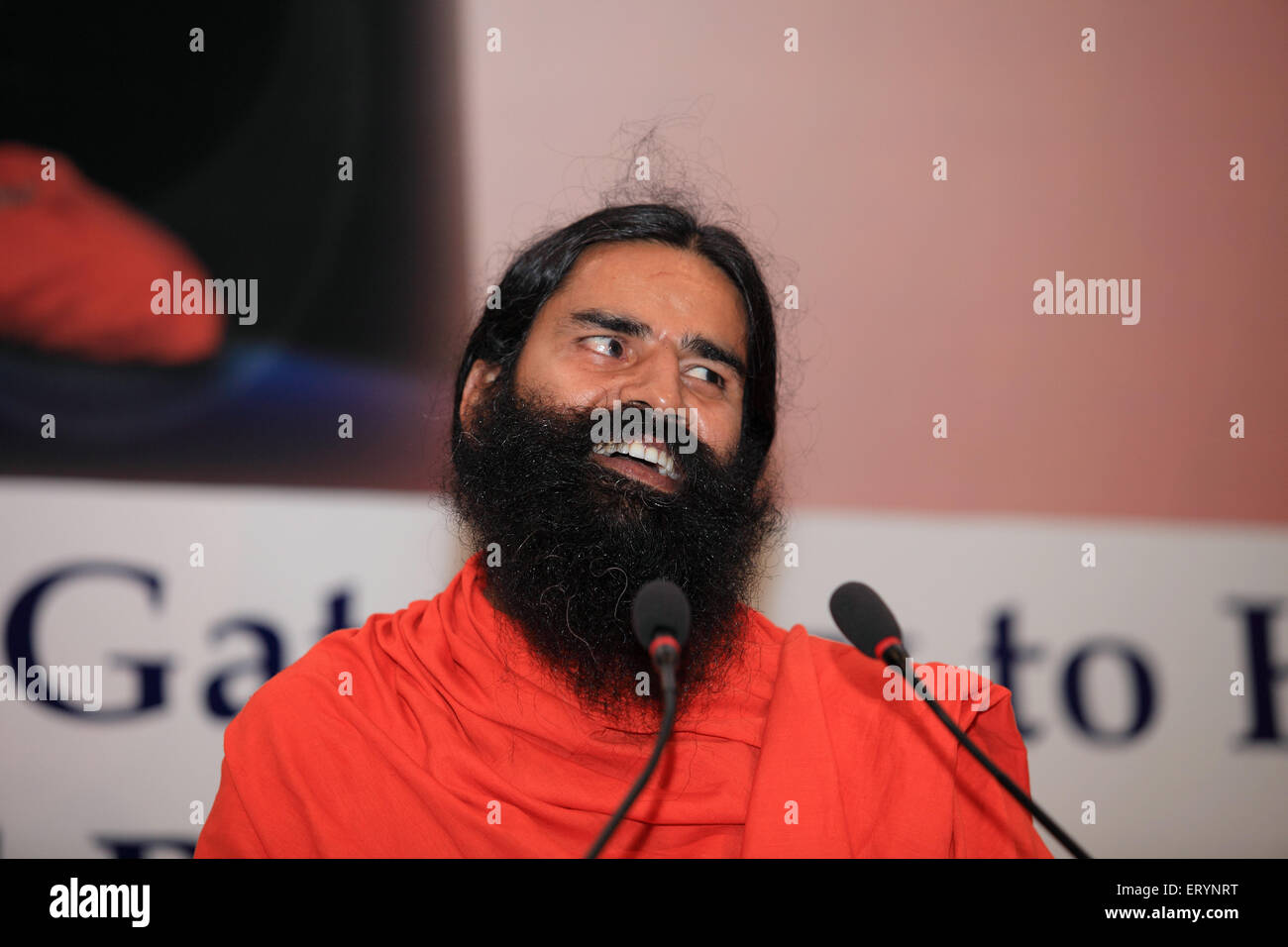 Baba Ramdev , Swami Ramdev , Indian yoga guru , demonstrating exercise ...