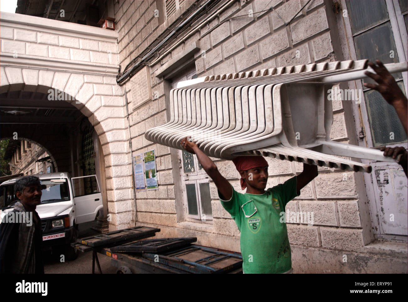 Carrying Chair Stock Photos & Carrying Chair Stock Images - Alamy