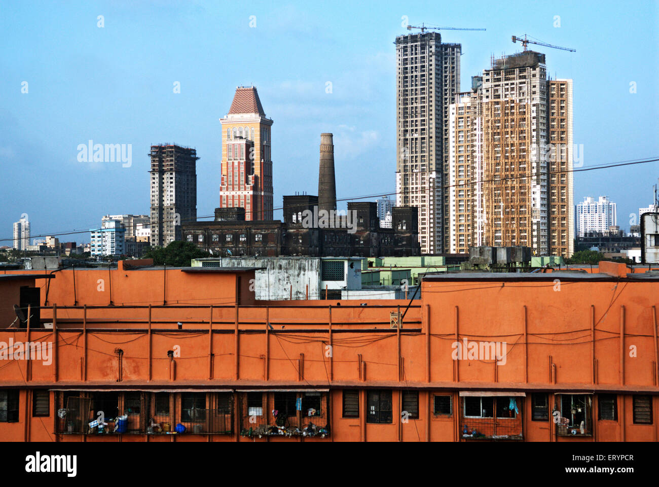 Old and new , Then and now , United India Mill chimney surrounded by ...