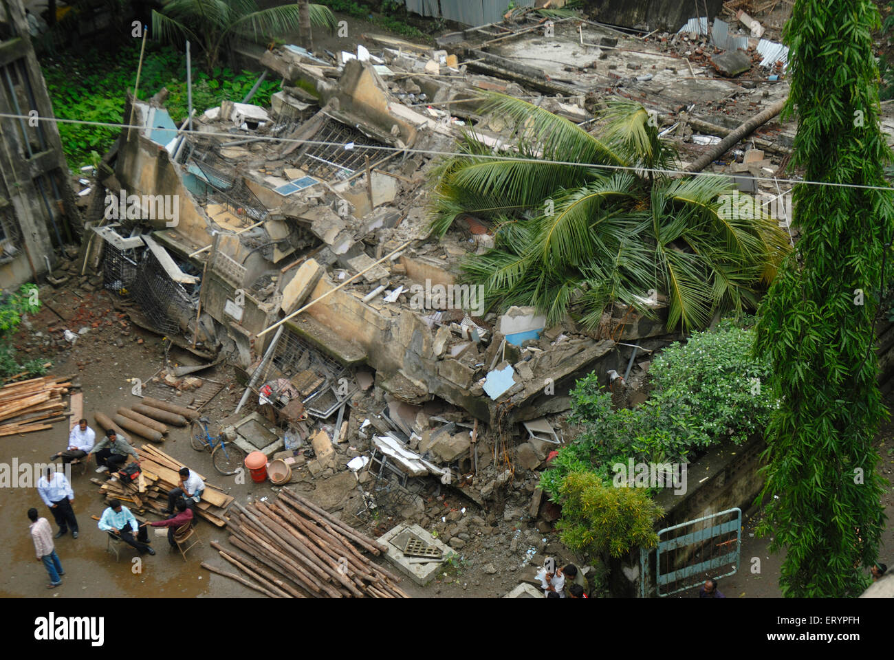 Twenty five years old building collapsed after it developed cracks in ...