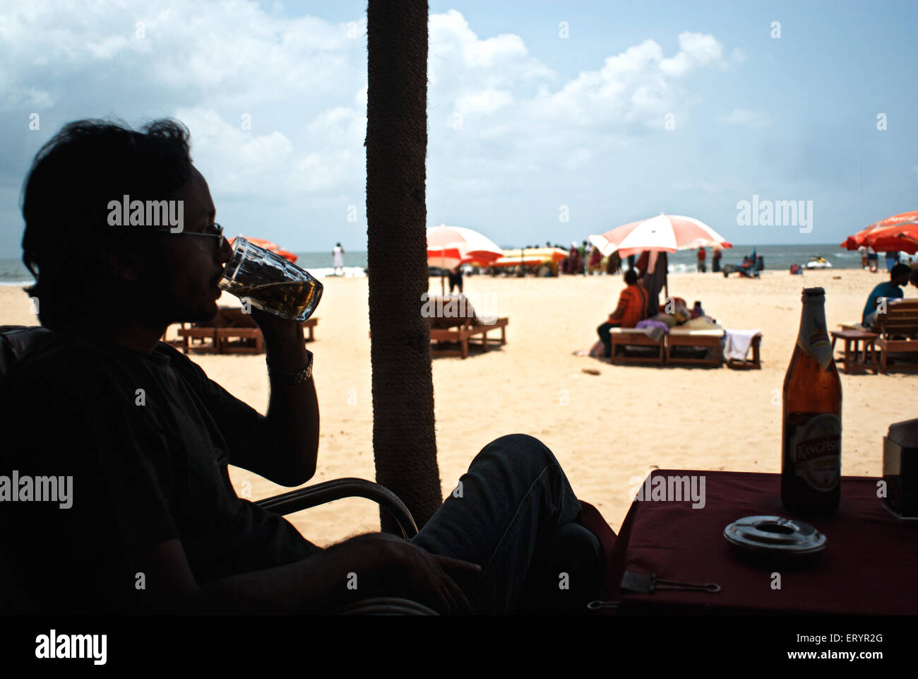 Tourist enjoying beer , Calangute beach ; Goa ; India , Asia Stock ...