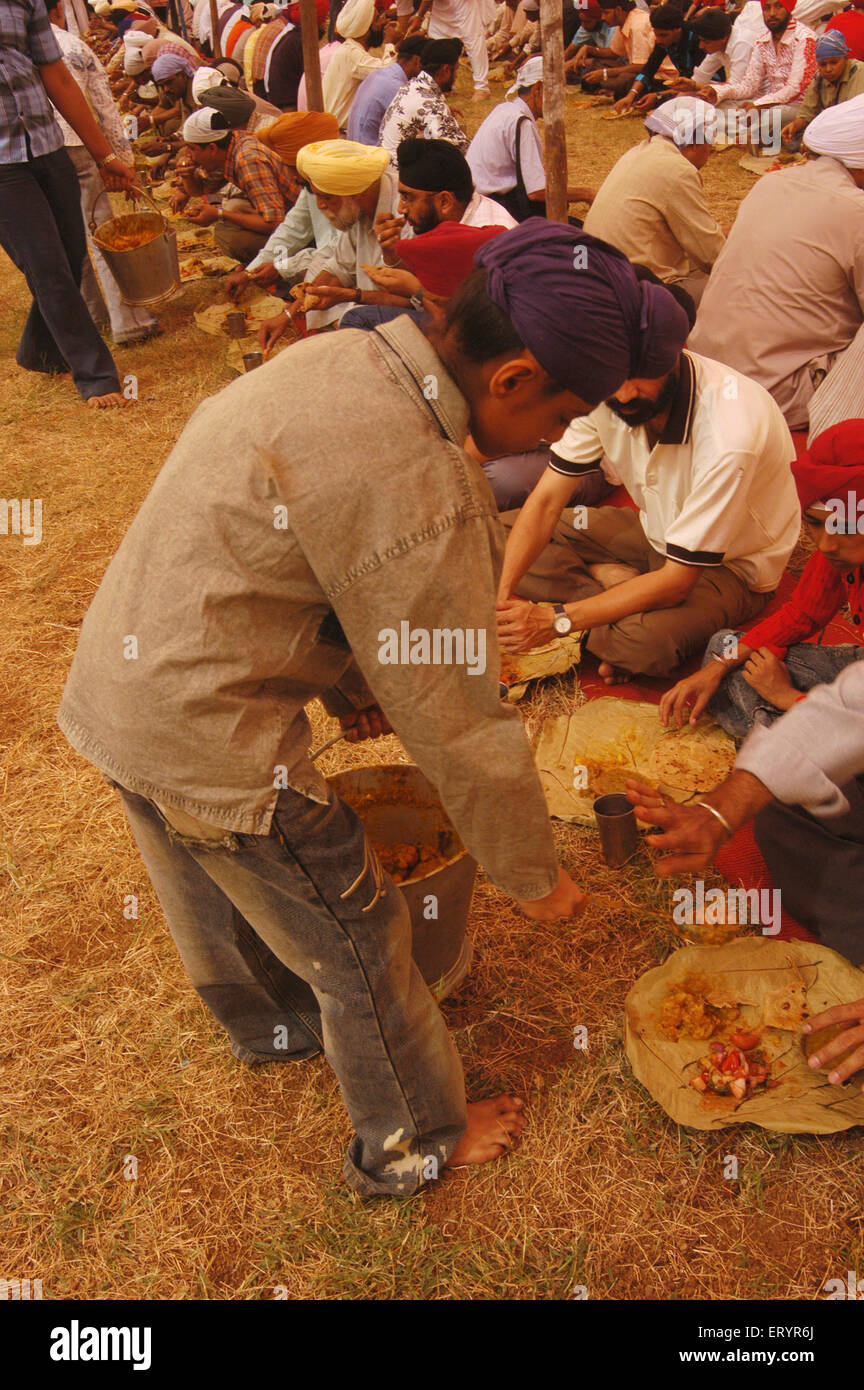 Sikh feast in Guru ka Langa at Ghatkopar in Bombay Mumbai ; Maharashtra ...