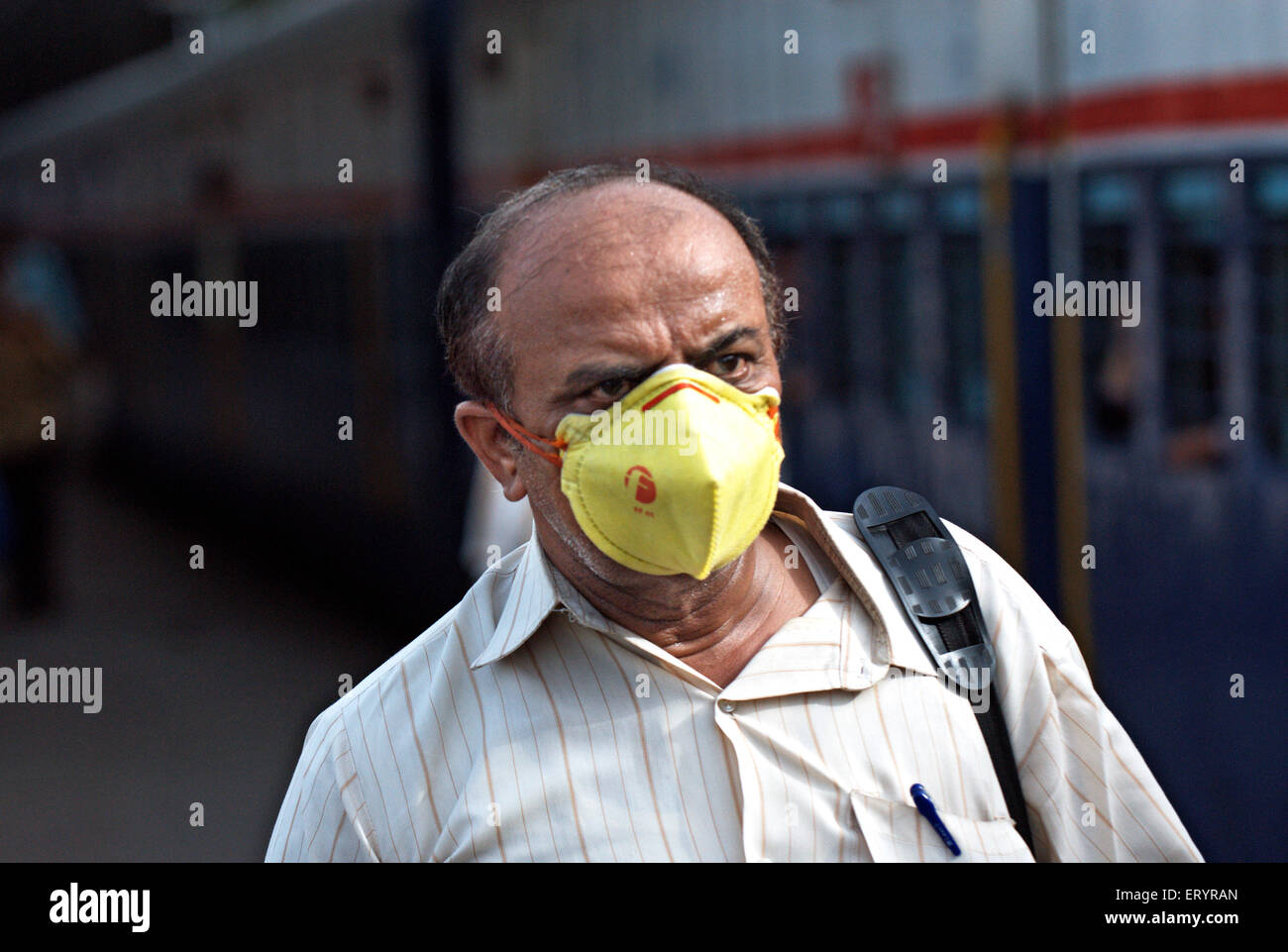 Man face with mask protection from virus ; Bombay ; Mumbai ...