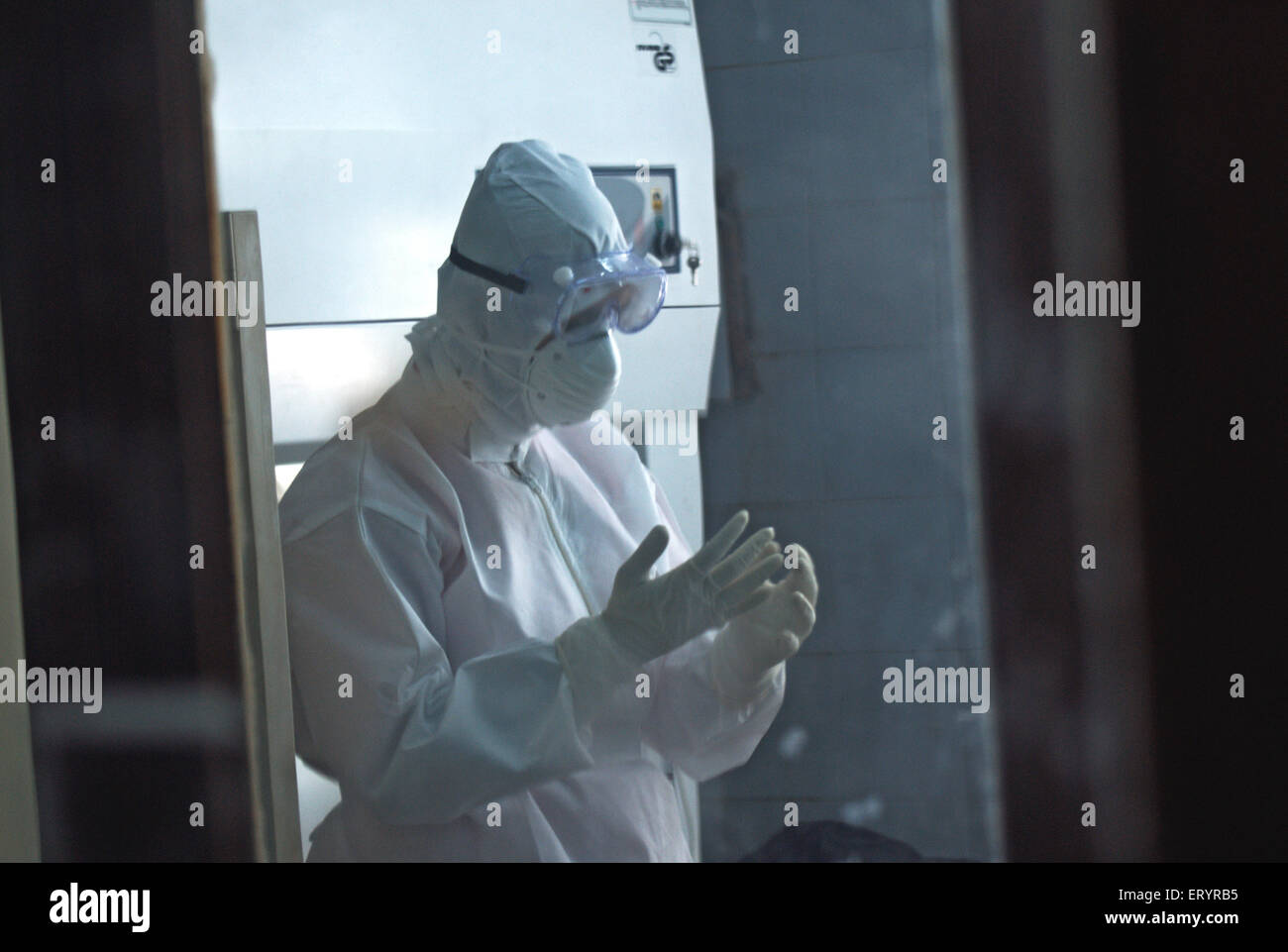 Scientist in protective gear in haffkine institute ; Bombay Mumbai ...