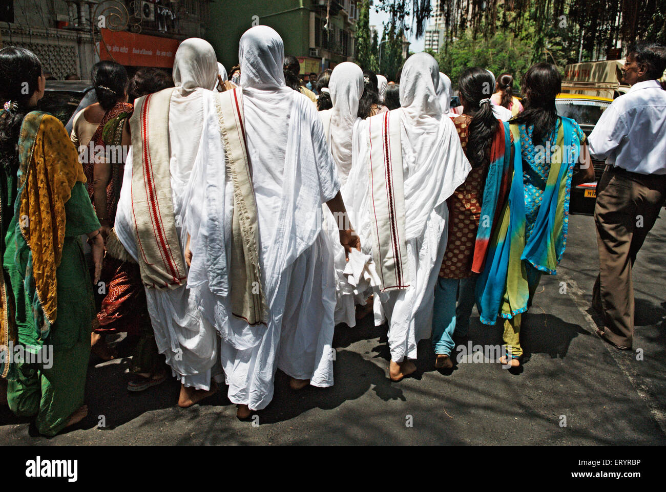 Jain sadhvi walking barefoot in diksha procession ; Bombay , Mumbai ...