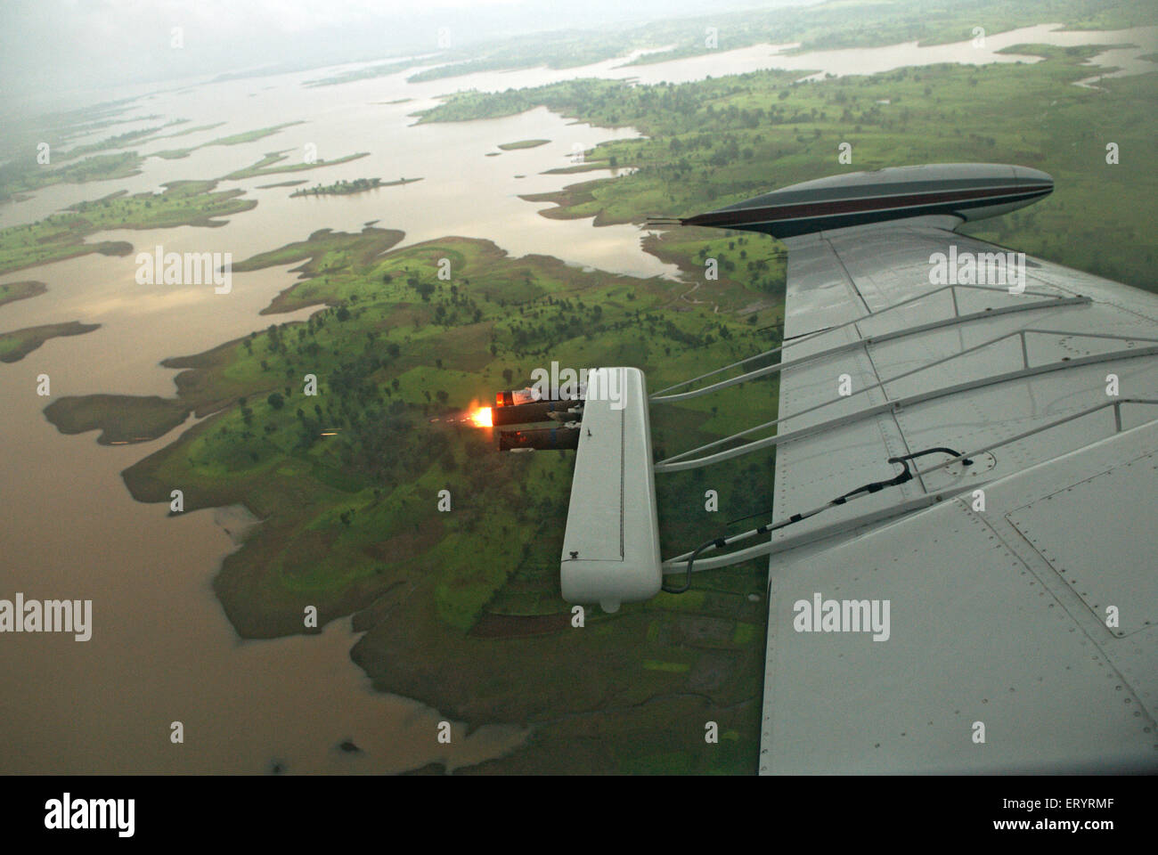 Cloud seeding by Piper Aircraft ; Upper Vaitarana Lake ; Vaitarna river ...