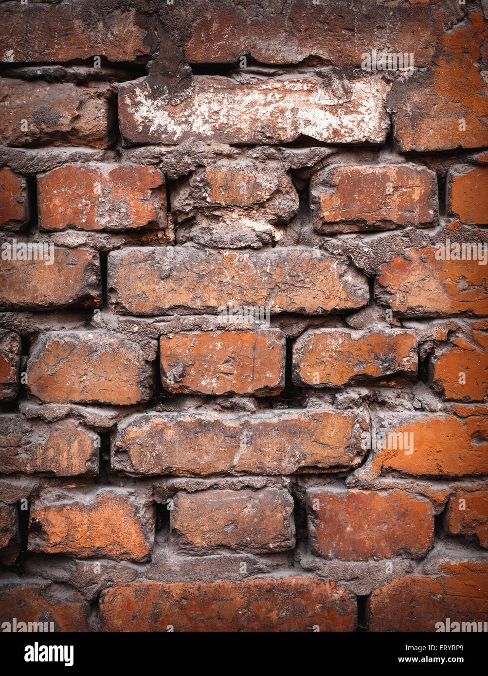 Background of colorful brick wall texture. brickwork. Peeling paint ...