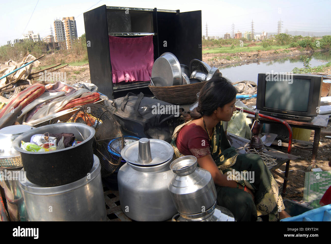Homeless , slum woman with utensils after house demolished , Bhandup ...