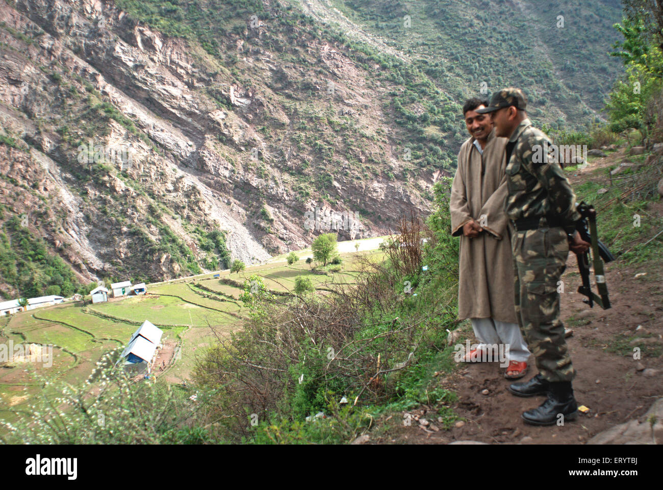 Border security force soldier with man of Urusa village ; Uri ; Jammu and Kashmir ; India NO MR ...