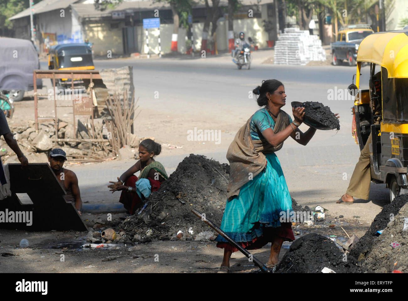 Worker cleaning sewage drains part of monsoon preparations to prevent ...