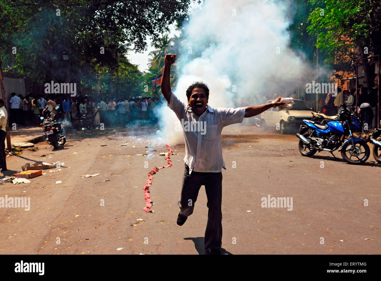 Man celebrating election victory bursting crackers , Maharashtra ...