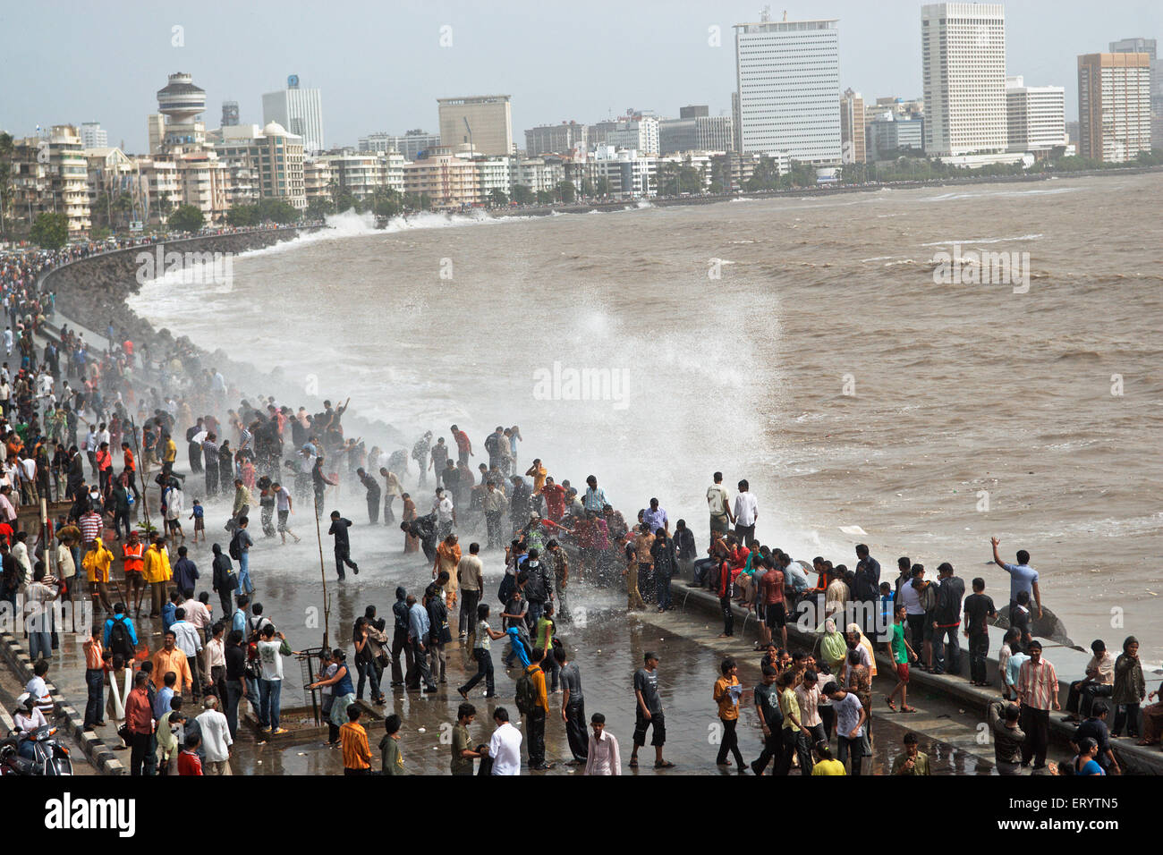 Mumbai monsoon , people enjoying sea waves , Marine Drive , Bombay ...