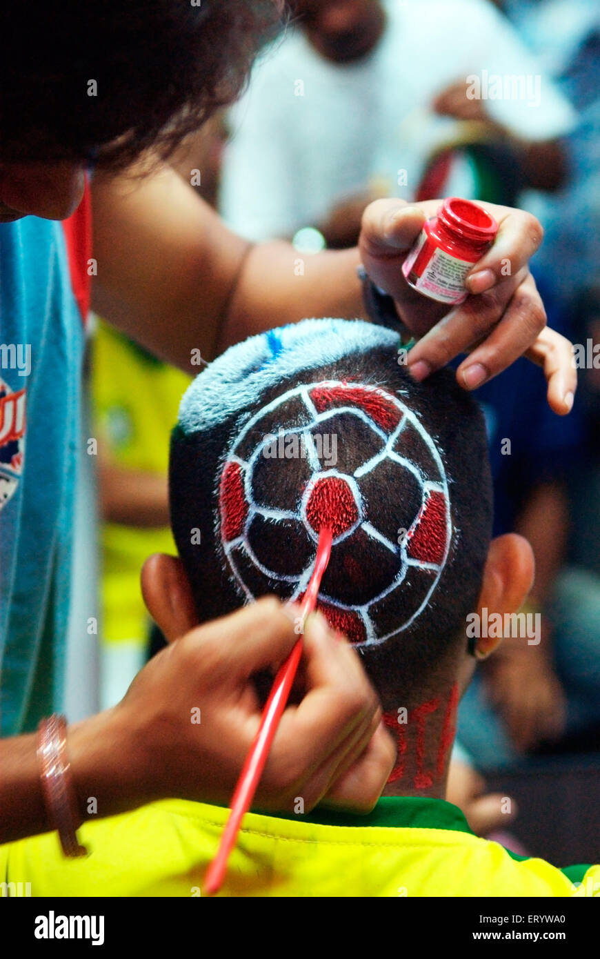 FIFA fever , football haircut during world cup ; Bombay , Mumbai ...