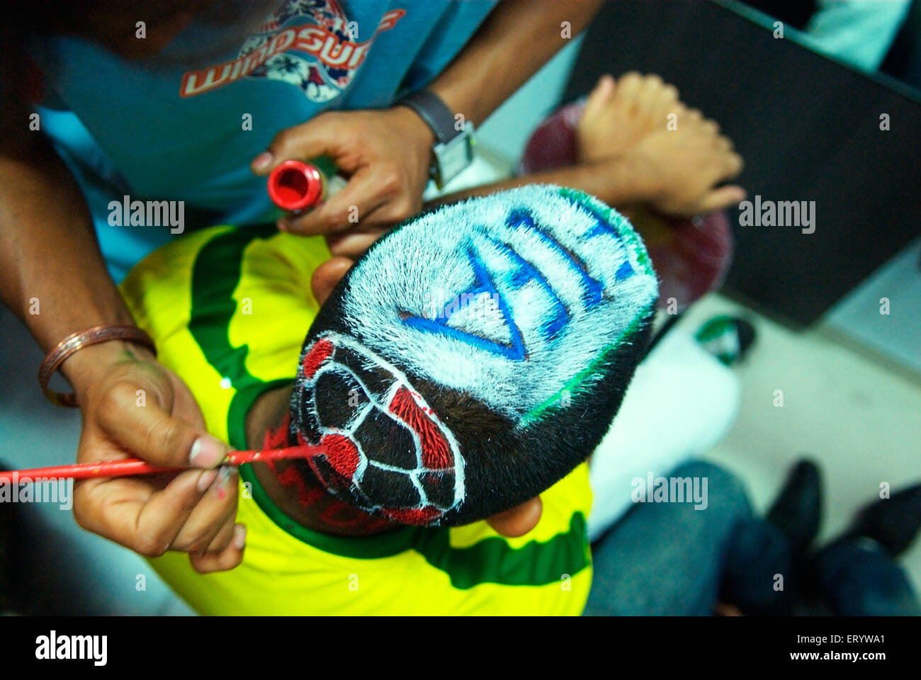 FIFA fever , football haircut during world cup ; Bombay , Mumbai ...
