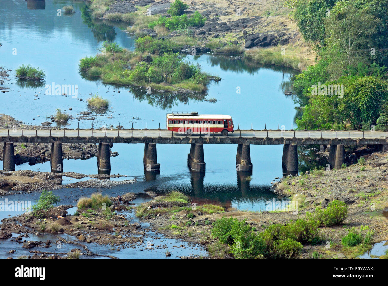 Bus crossing a bridge on chorna river ; Bombay ; Mumbai ; Maharashtra ... Bus crossing a bridge on chorna river ; Bombay ; Mumbai ; Maharashtra ...