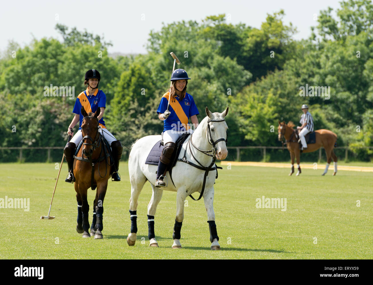 Two female Aberdeen University polo players Stock Photo - Alamy