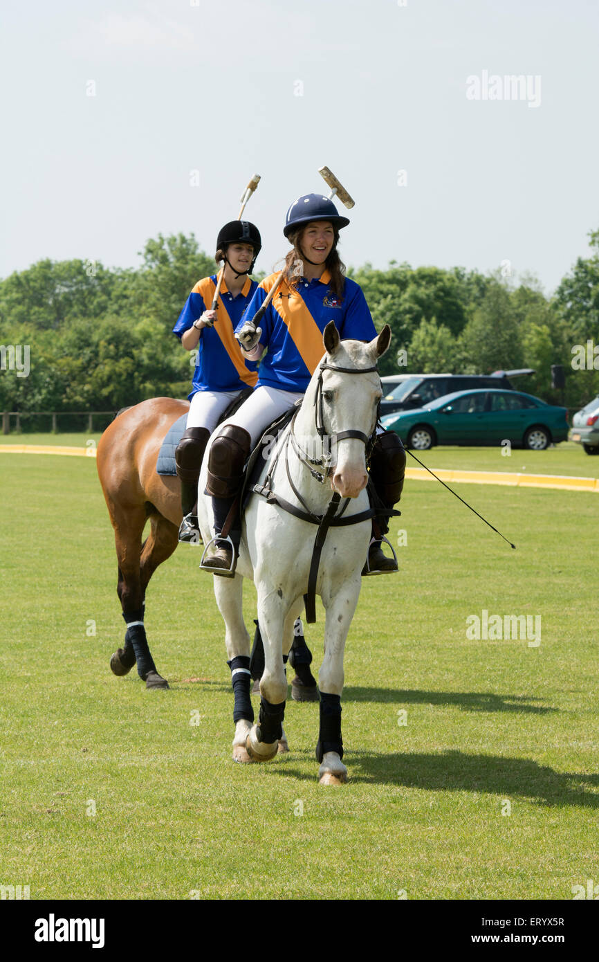 Two female Aberdeen University polo players Stock Photo - Alamy